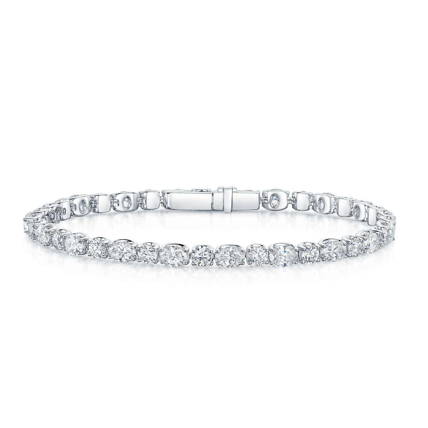 18ct White Gold Oval And Round Brilliant Cut Diamond Claw Set Tennis B
